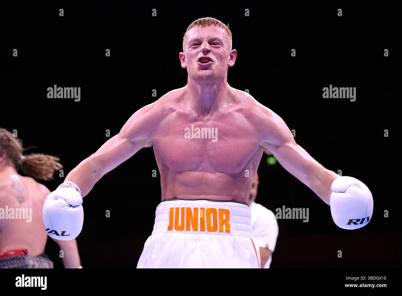 Alex Arthur Jr celebrates victory in the super middleweight bout ...