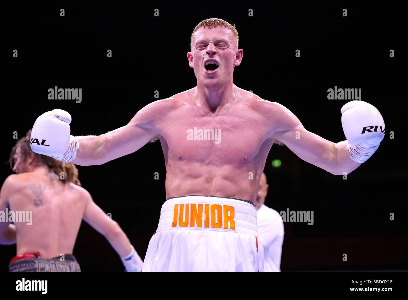 Alex Arthur Jr celebrates victory in the super middleweight bout ...