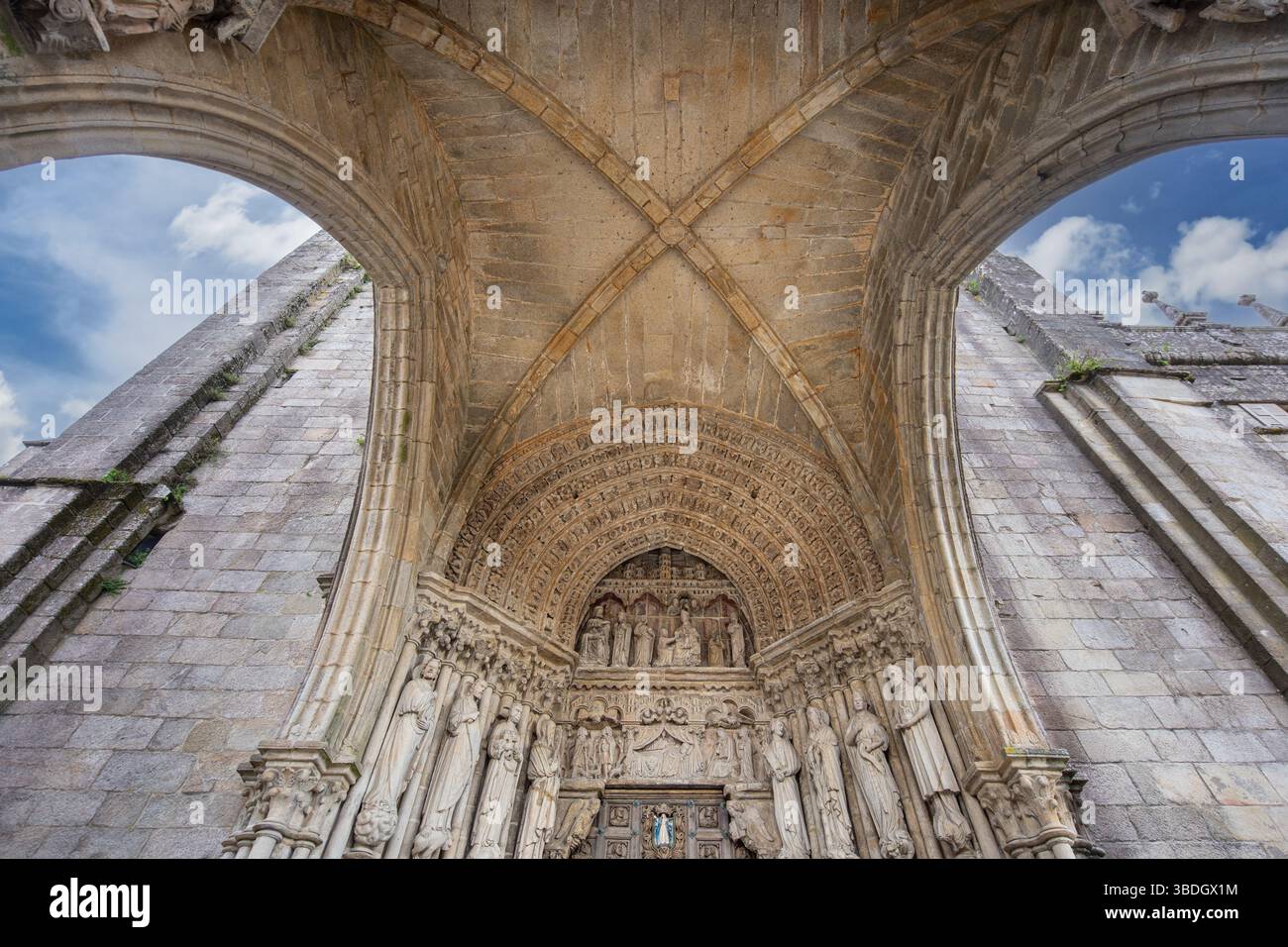 Intricate portico of Santa Maria Cathedral in Tui, Spain, a pioneering ...