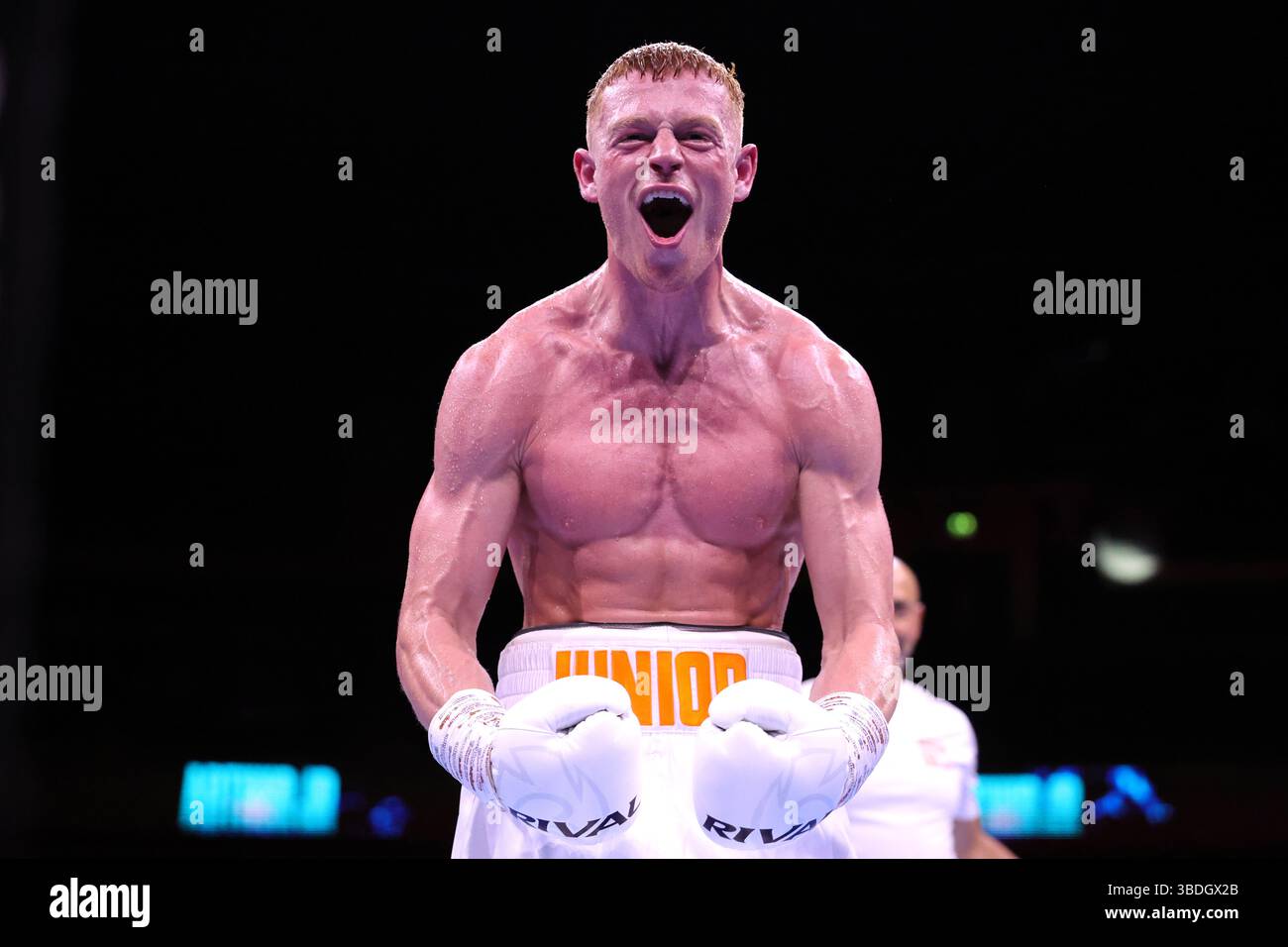 Alex Arthur Jr celebrates victory in the super middleweight bout ...