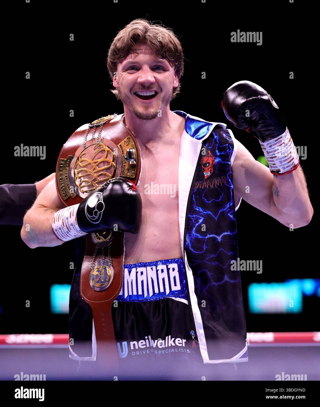 Aston Brown celebrates victory in the middleweight bout against Reece ...