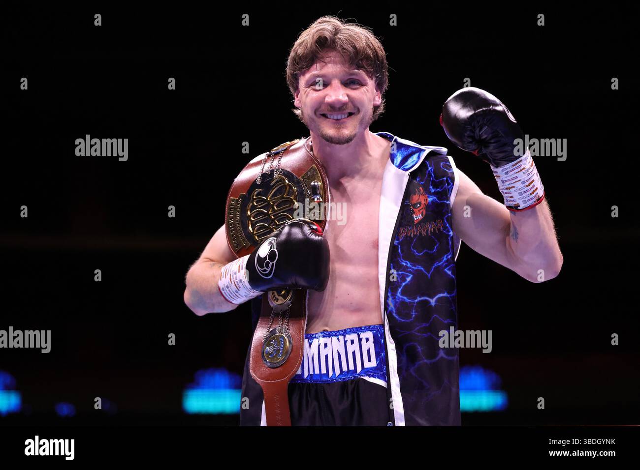 Aston Brown celebrates victory in the middleweight bout against Reece ...