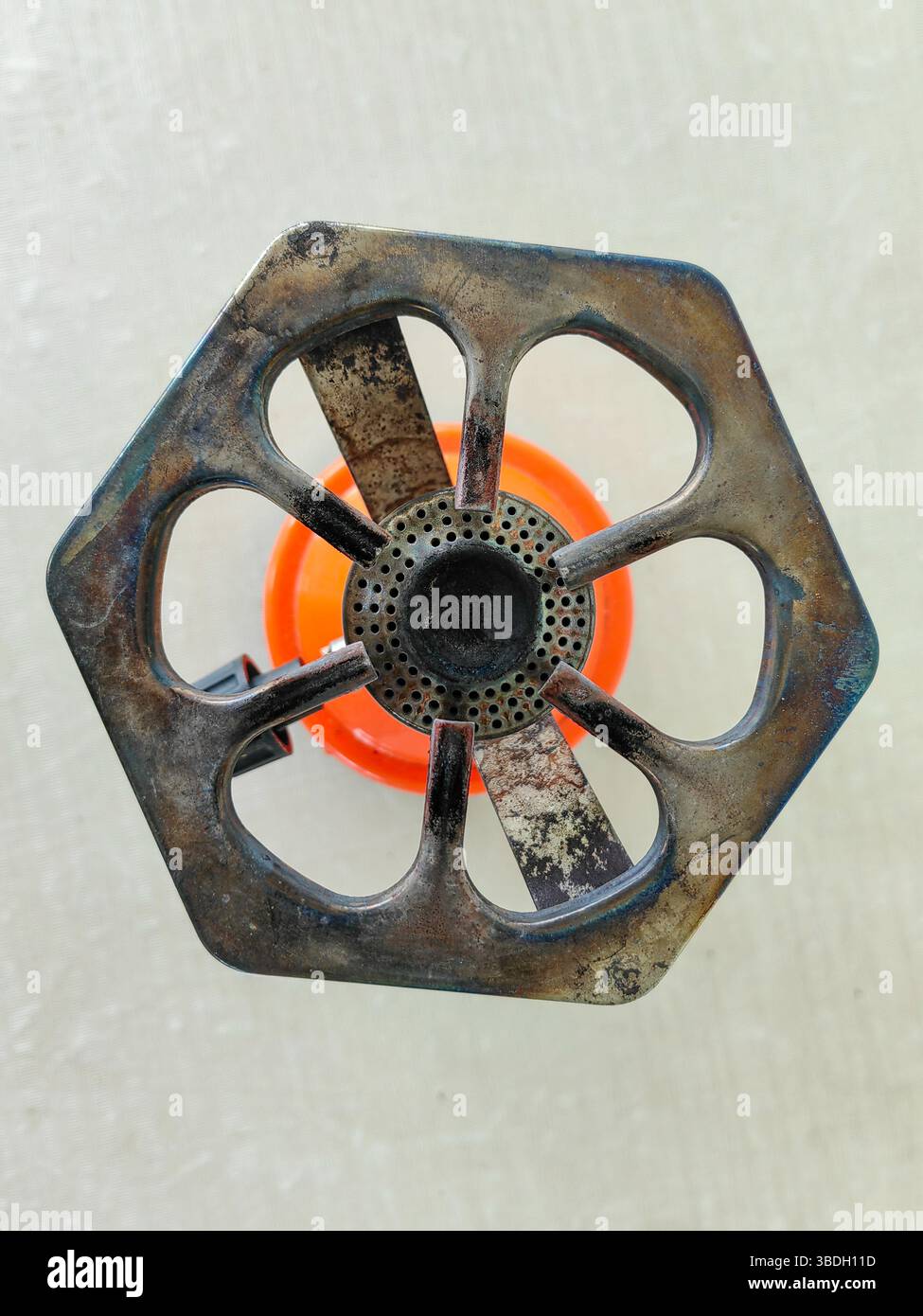 Used Hexagon-Shaped Portable Gas Stove – Top View Stock Photo - Alamy