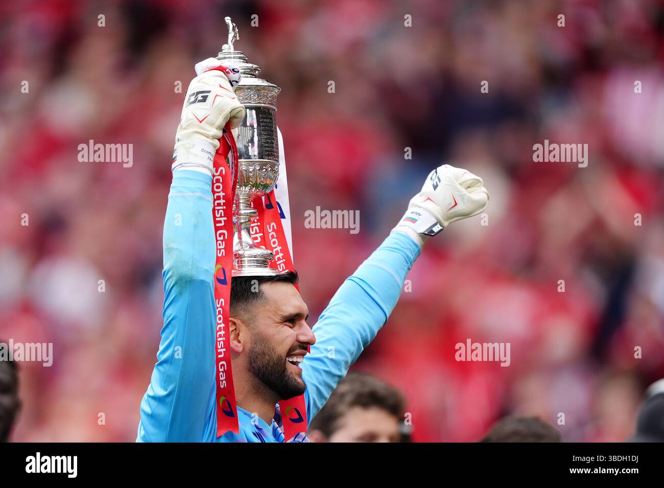 Aberdeen goalkeeper Dimitar Mitov celebrates with the trophy after the ...
