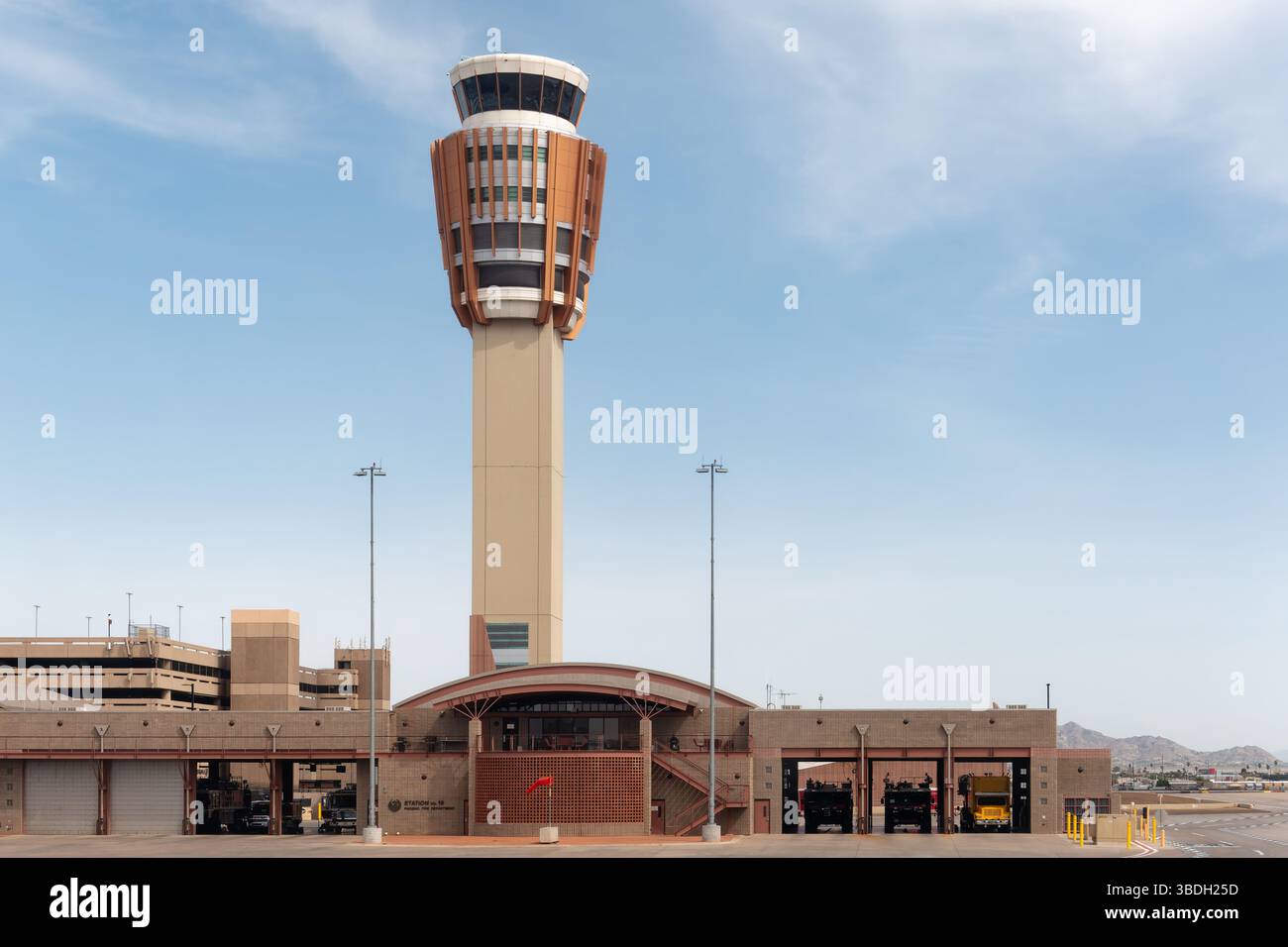 Phoenix, AZ - March 31, 2025: Airport Traffic Control Tower and Phoenix ...