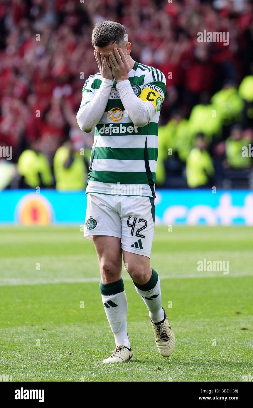 Celtic's Callum McGregor reacts after missing in the penalty shoot-out ...