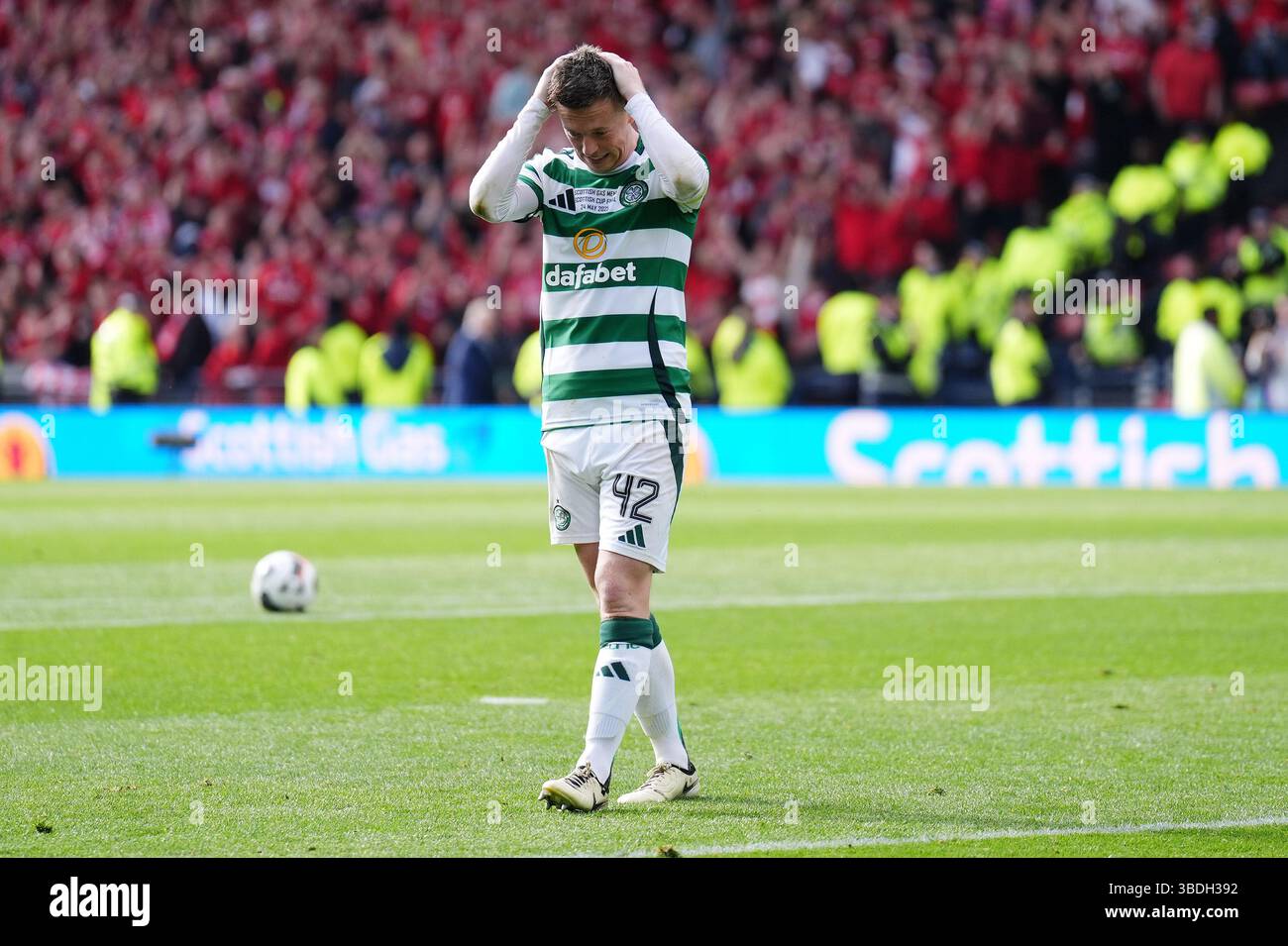 Celtic's Callum McGregor reacts after missing in the penalty shoot-out ...