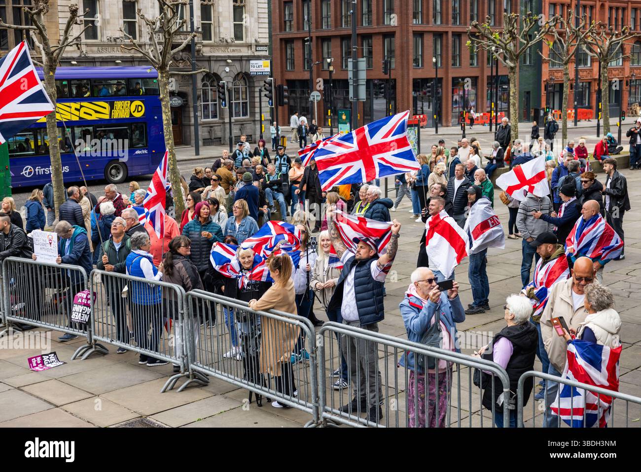 Leeds, UK. 24 MAY, 2025. People gather as the right-leaning "Great ...