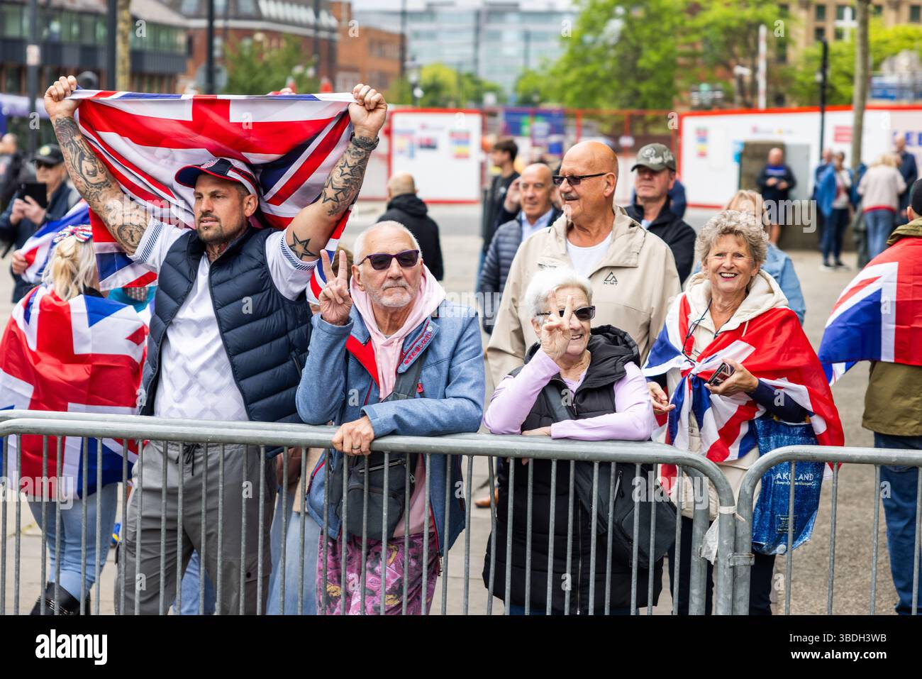 Leeds, UK. 24 MAY, 2025. People gather as the right-leaning "Great ...