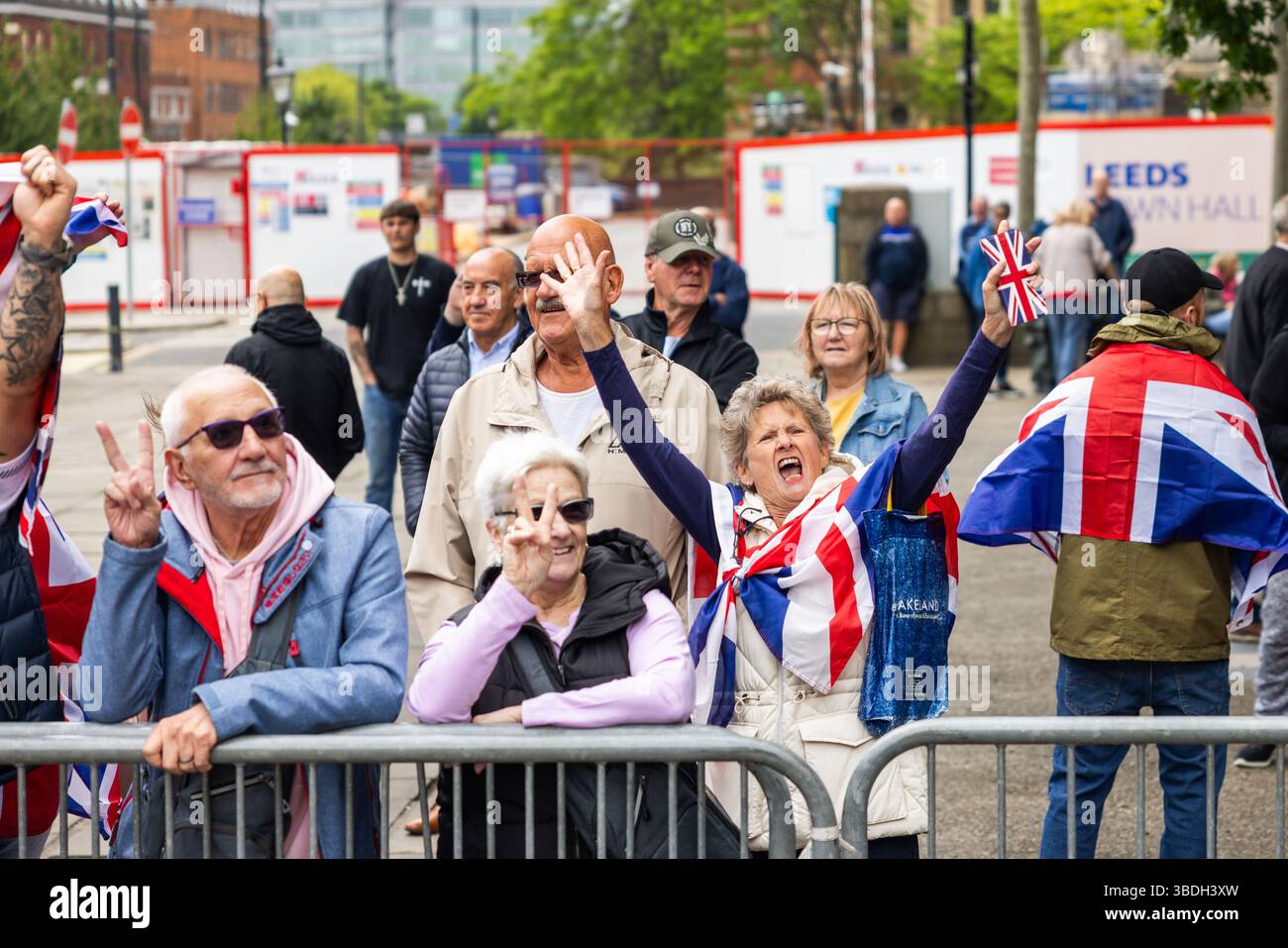 Leeds, UK. 24 MAY, 2025. People gather as the right-leaning "Great ...