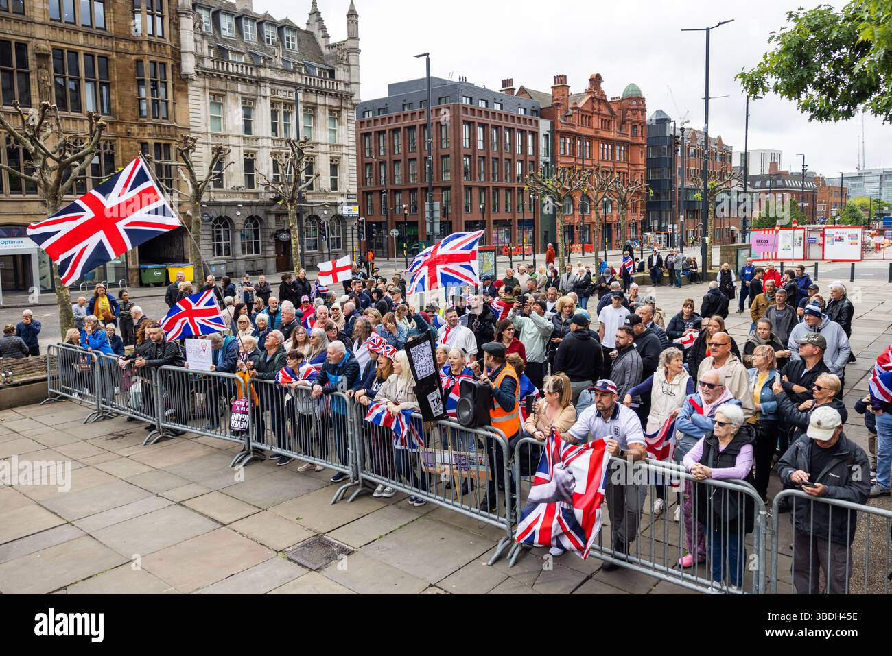 Leeds, UK. 24 MAY, 2025. People gather as the right-leaning "Great ...