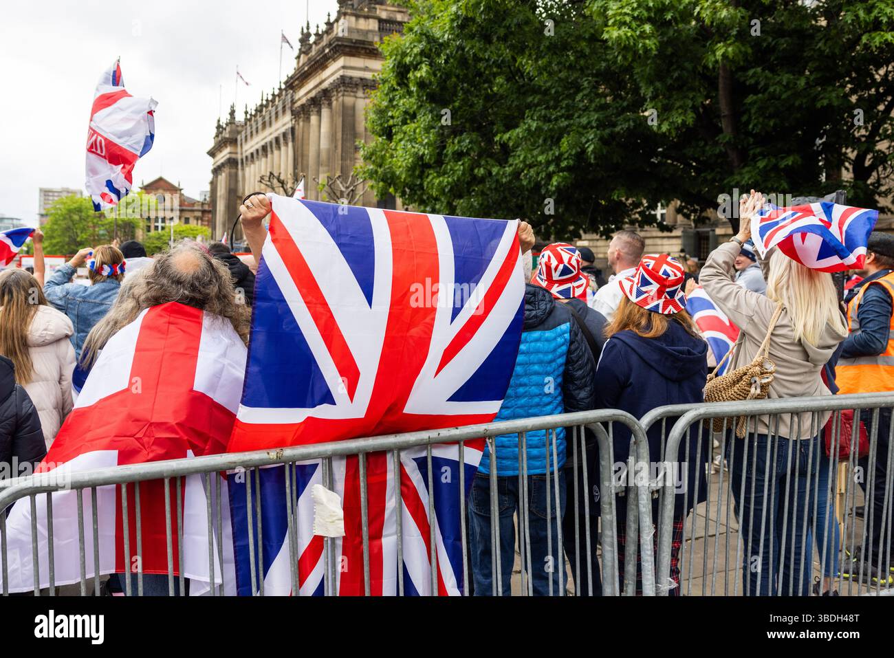 Leeds, UK. 24 MAY, 2025. People gather as the right-leaning "Great ...