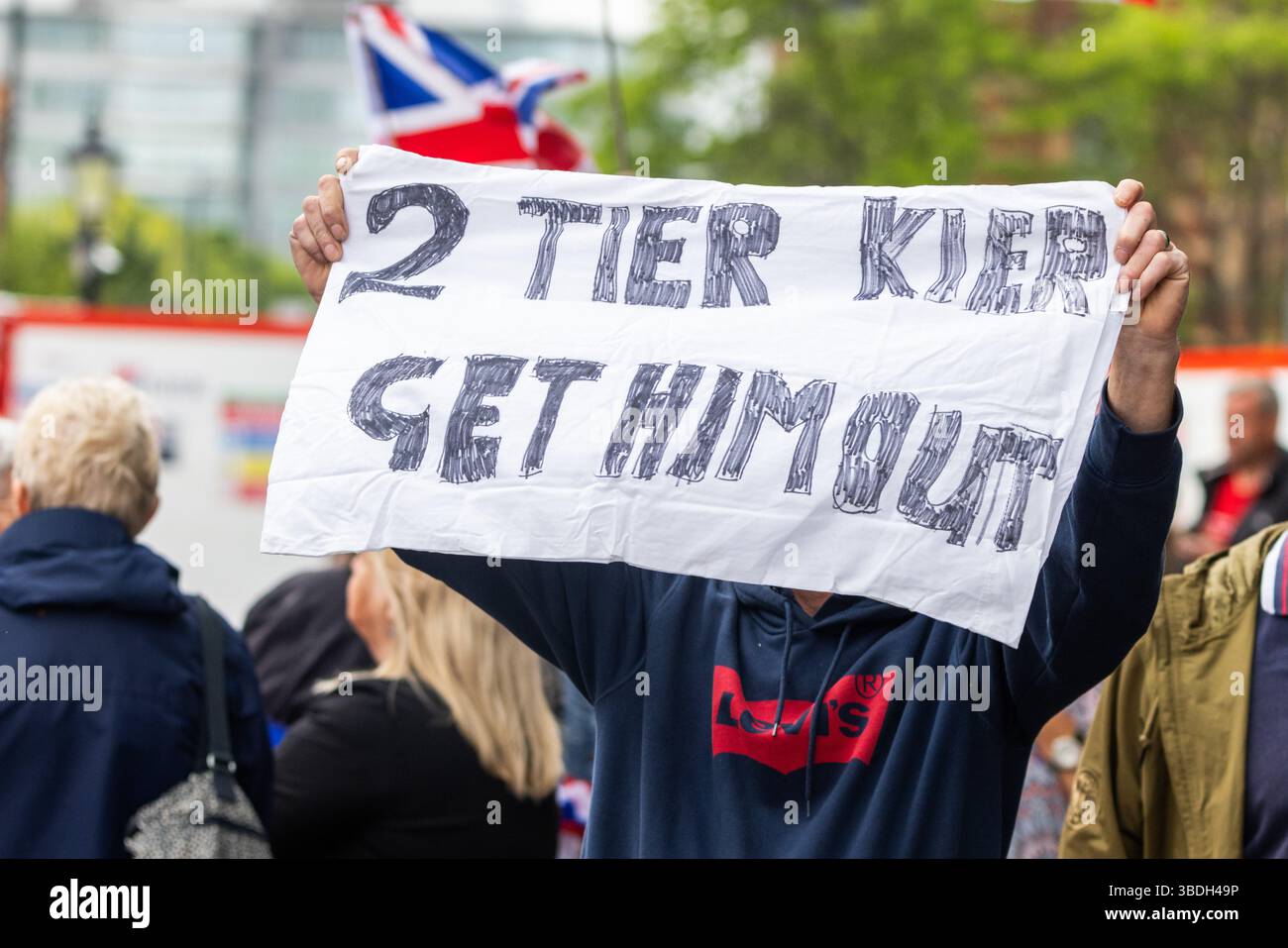 Leeds, UK. 24 MAY, 2025. "2 Tier Kier Get Him Out" banner as the right ...