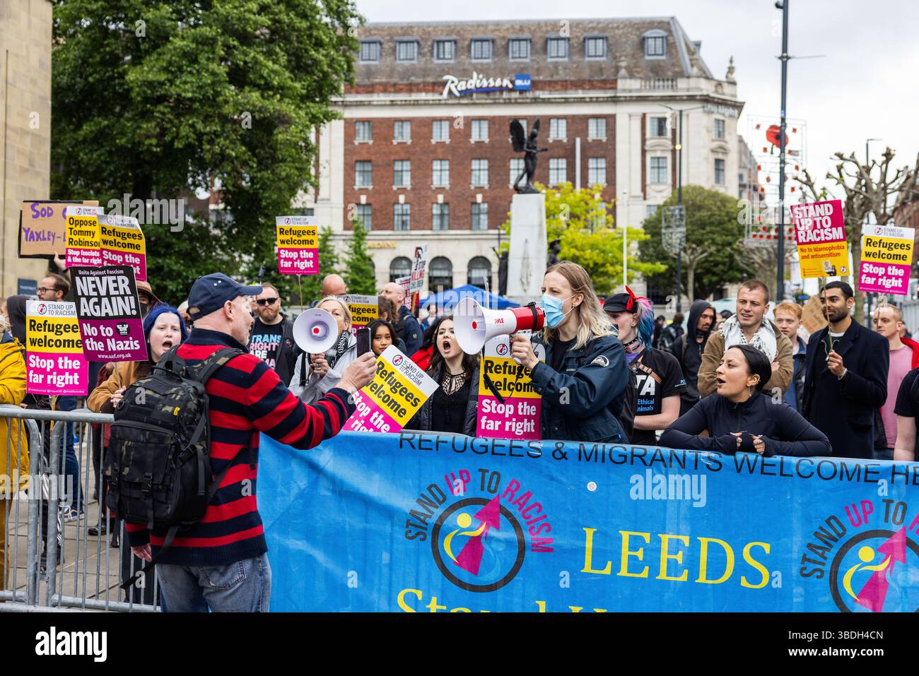 Leeds, UK. 24 MAY, 2025. Person argues with the counter protestors as ...