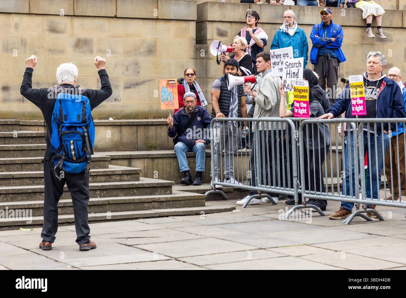 Leeds, UK. 24 MAY, 2025. Person argues with the counter protestors as ...
