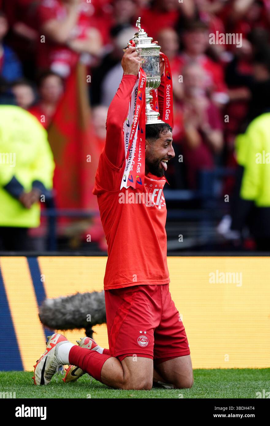 Aberdeen's Oday Dabbagh with the trophy after winning the Scottish Gas ...