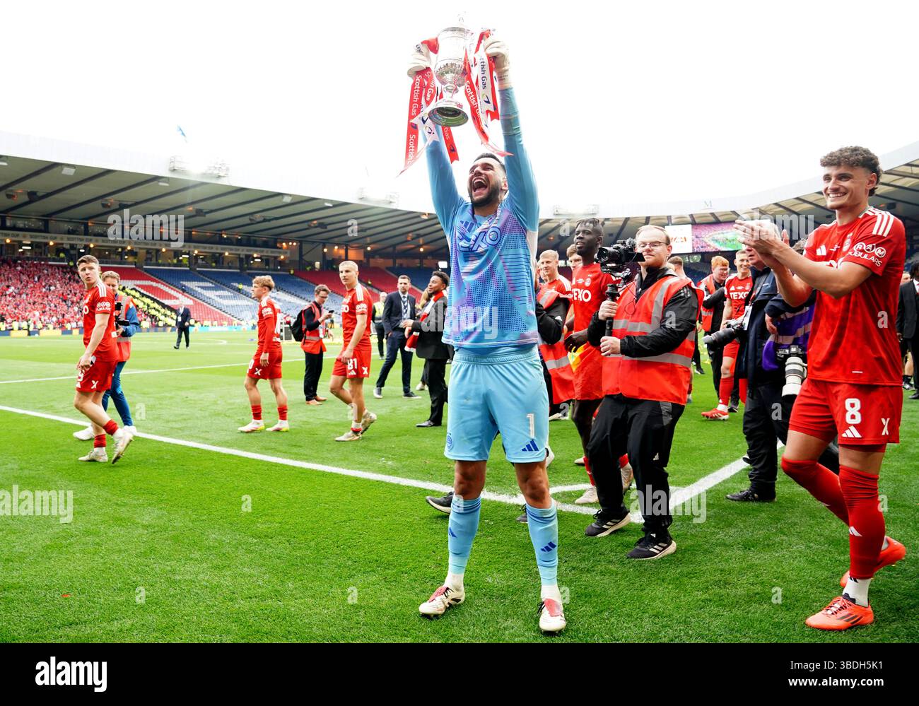 Aberdeen goalkeeper Dimitar Mitov celebrates with the trophy on the ...