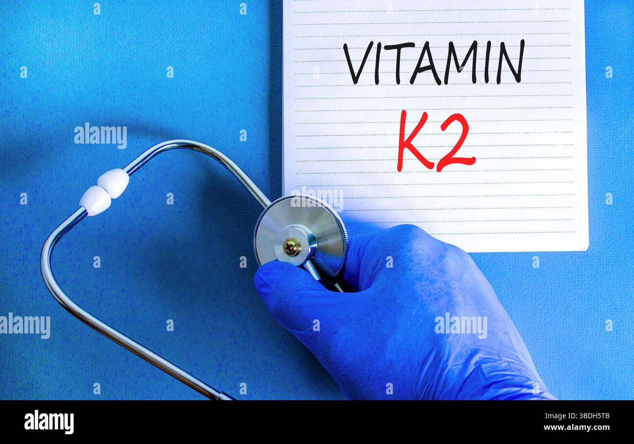 Vitamin K2 phylloquinone symbol. Concept words Vitamin K2 on beautiful ...