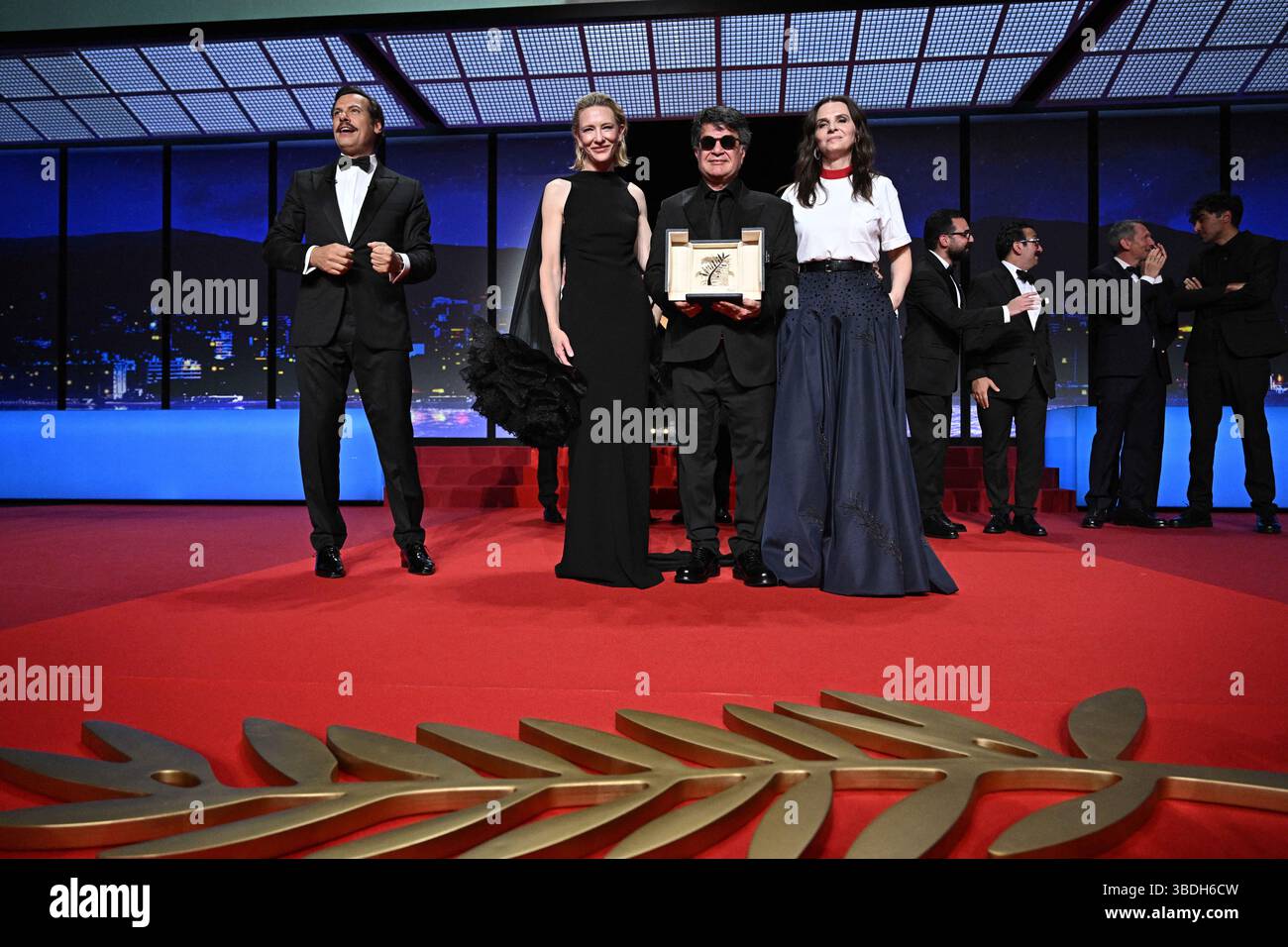 Cannes, France. 24th May, 2025. Iranian director and screenwriter and producer Jafar Panahi (C ...