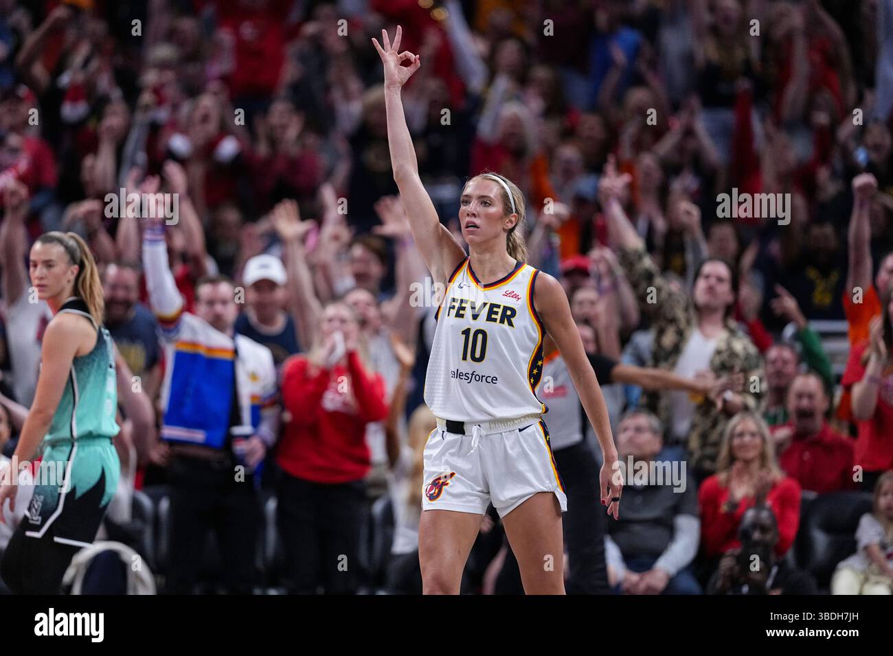 Indiana Fever guard Lexie Hull (10) celebrates after a three-point ...