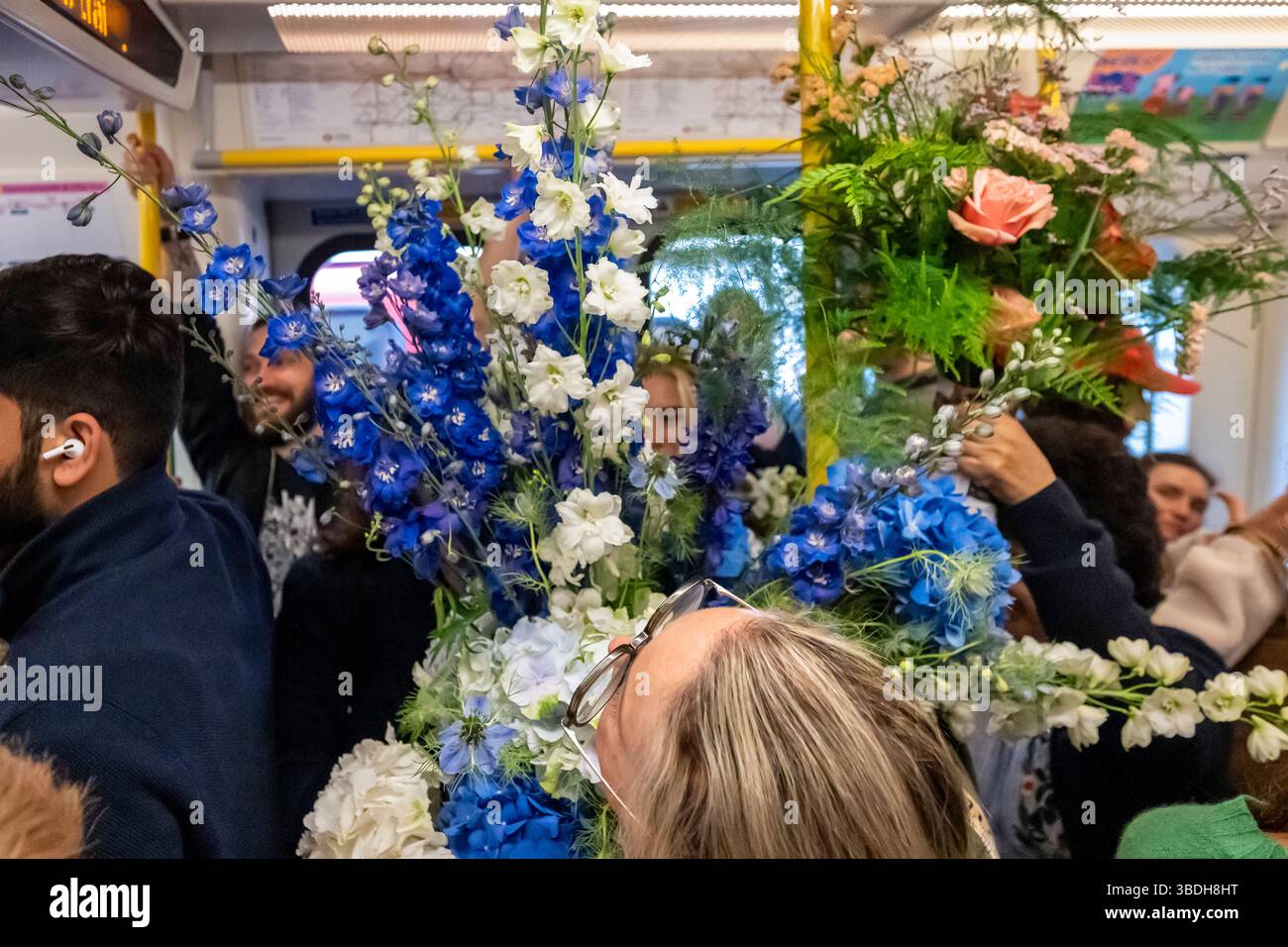 London, UK. 24 May 2025. A member of the public rides the District line ...