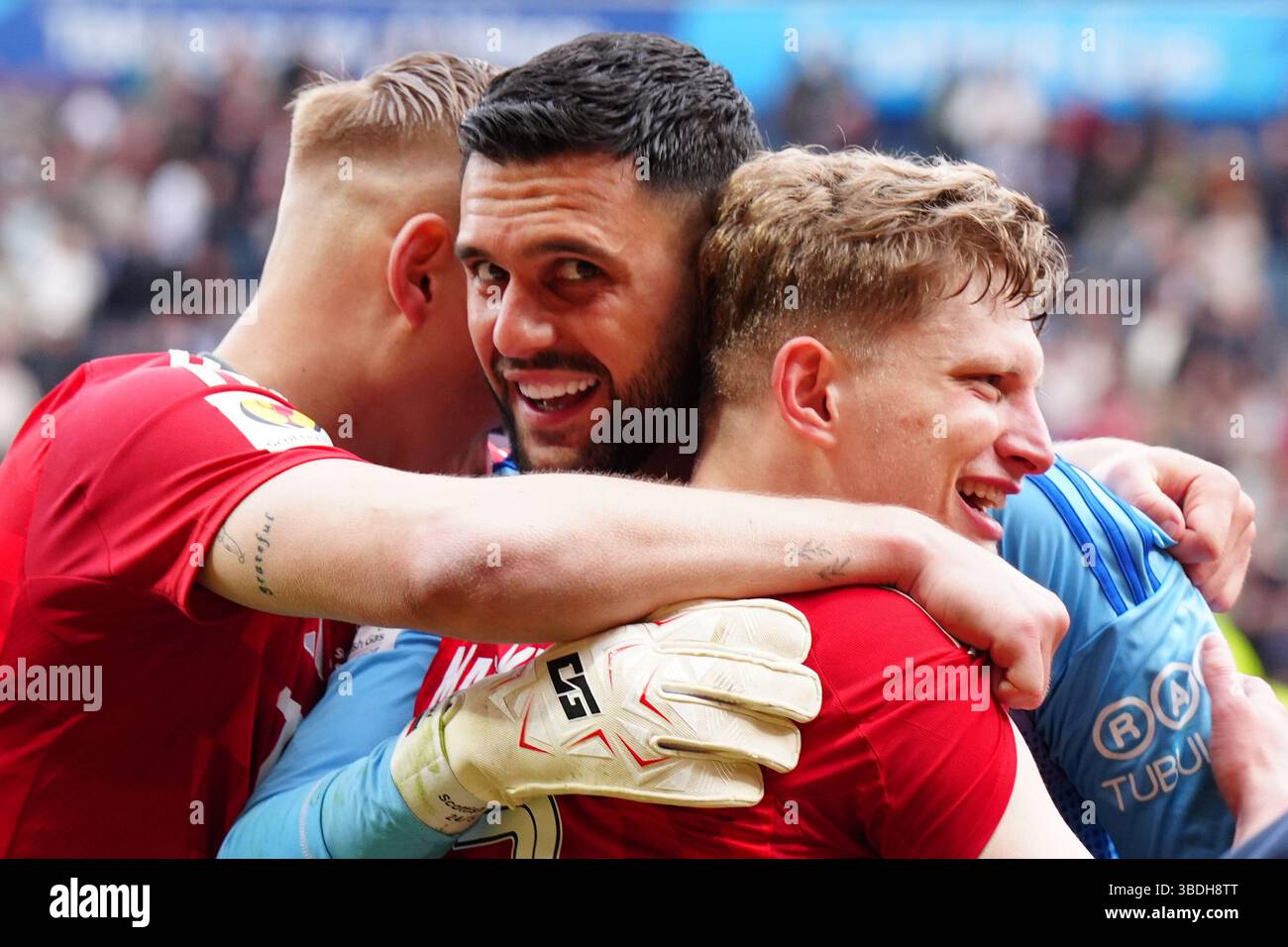 Aberdeen goalkeeper Dimitar Mitov (centre) celebrates with his team ...