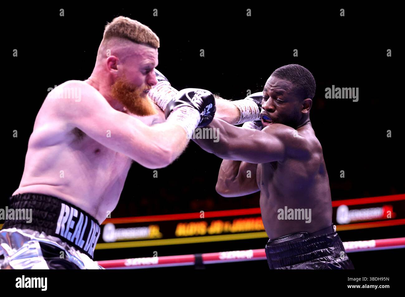 Aloys Youmbi (right) in action against David Jamieson in the vacant ...