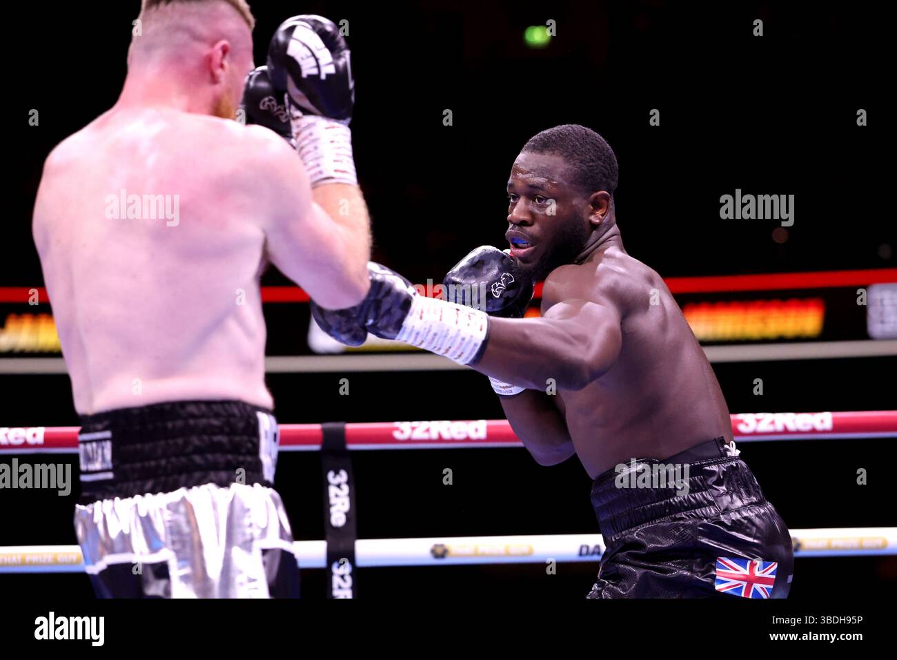 Aloys Youmbi (right) in action against David Jamieson in the vacant ...