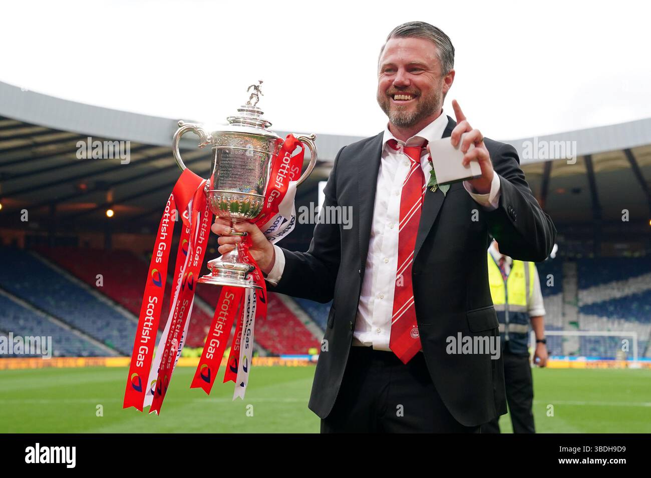 Aberdeen manager Jimmy Thelin with the trophy after the Scottish Gas Men's Scottish Cup final at ...