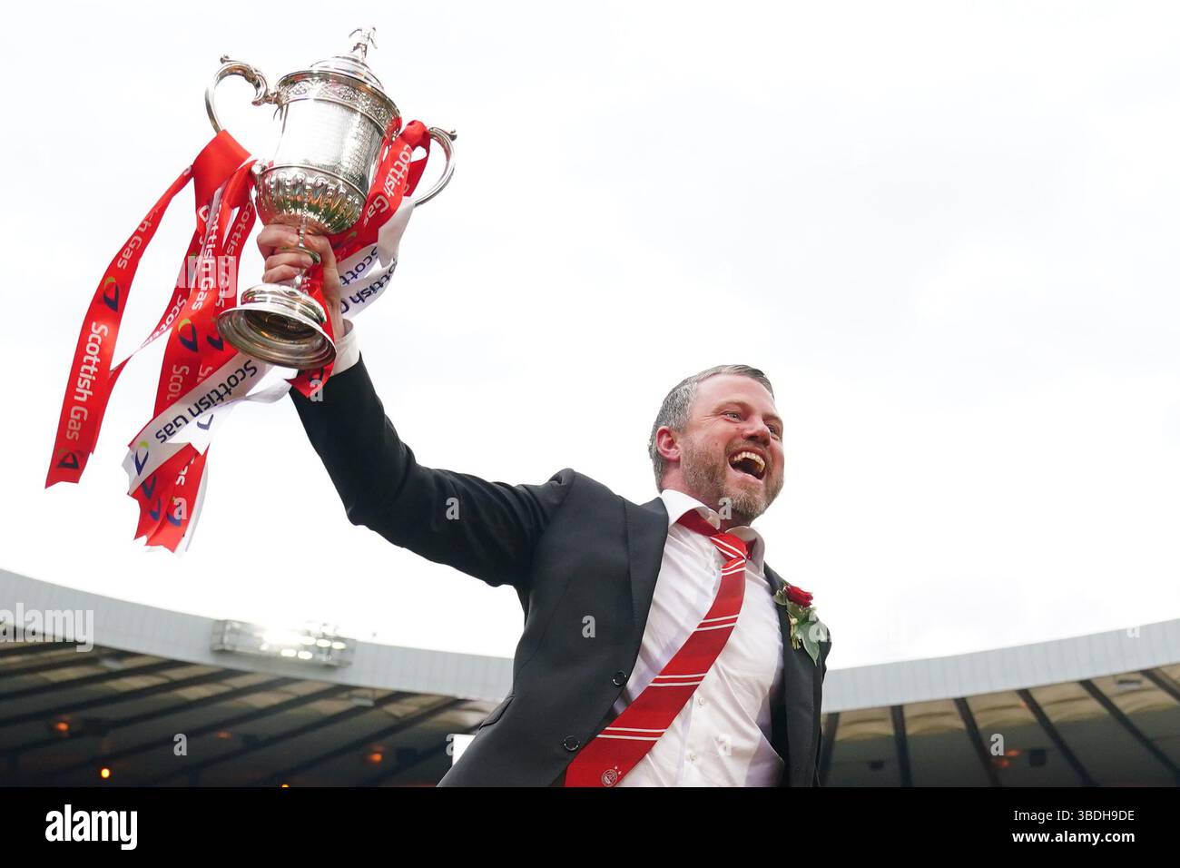 Aberdeen manager Jimmy Thelin with the trophy after the Scottish Gas ...