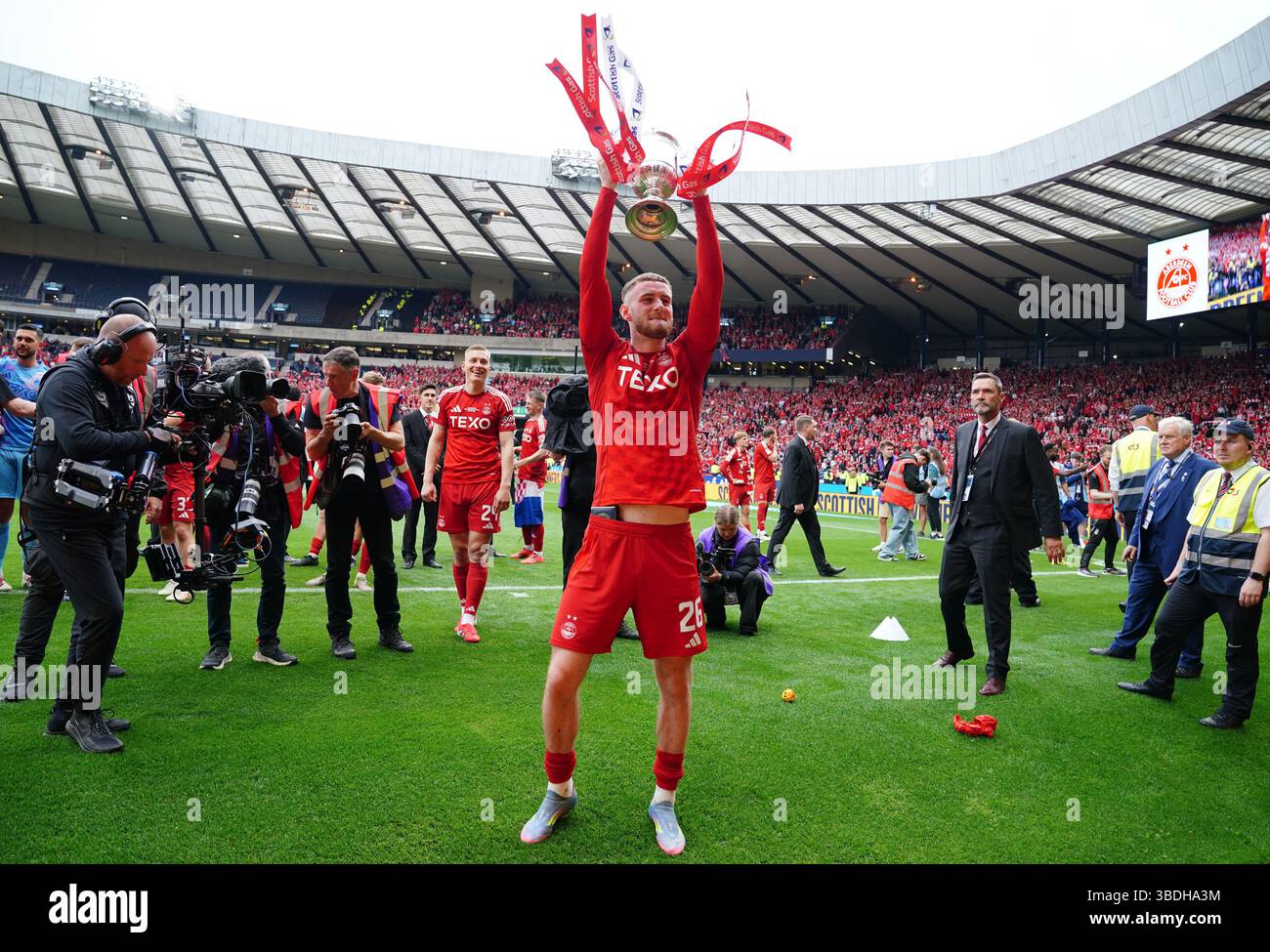 Aberdeen's Alfie Dorrington with the trophy after the Scottish Gas Men ...