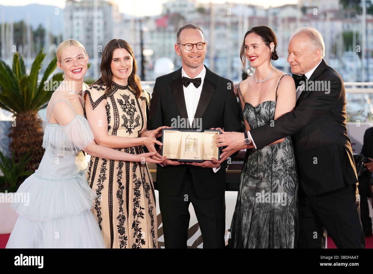 Director Joachim Trier, centre, winner of the grand prix for the film 'Sentimental Value', poses ...