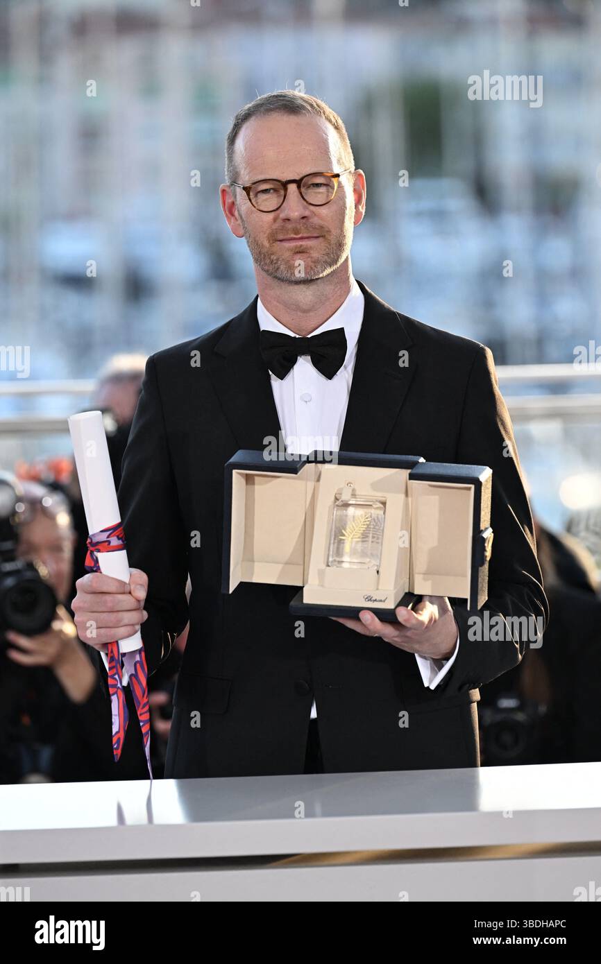 Cannes, France. 24th May, 2025. Norwegian director and screenwriter Joachim Trier poses during a ...
