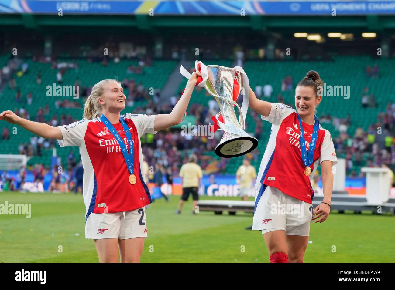 Arsenal's Emily Fox, left, and Arsenal's Jenna Nighswonger celebrate ...