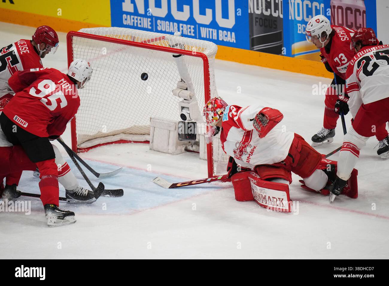 Switzerland's Tyler Moy scores during the semifinal match between ...