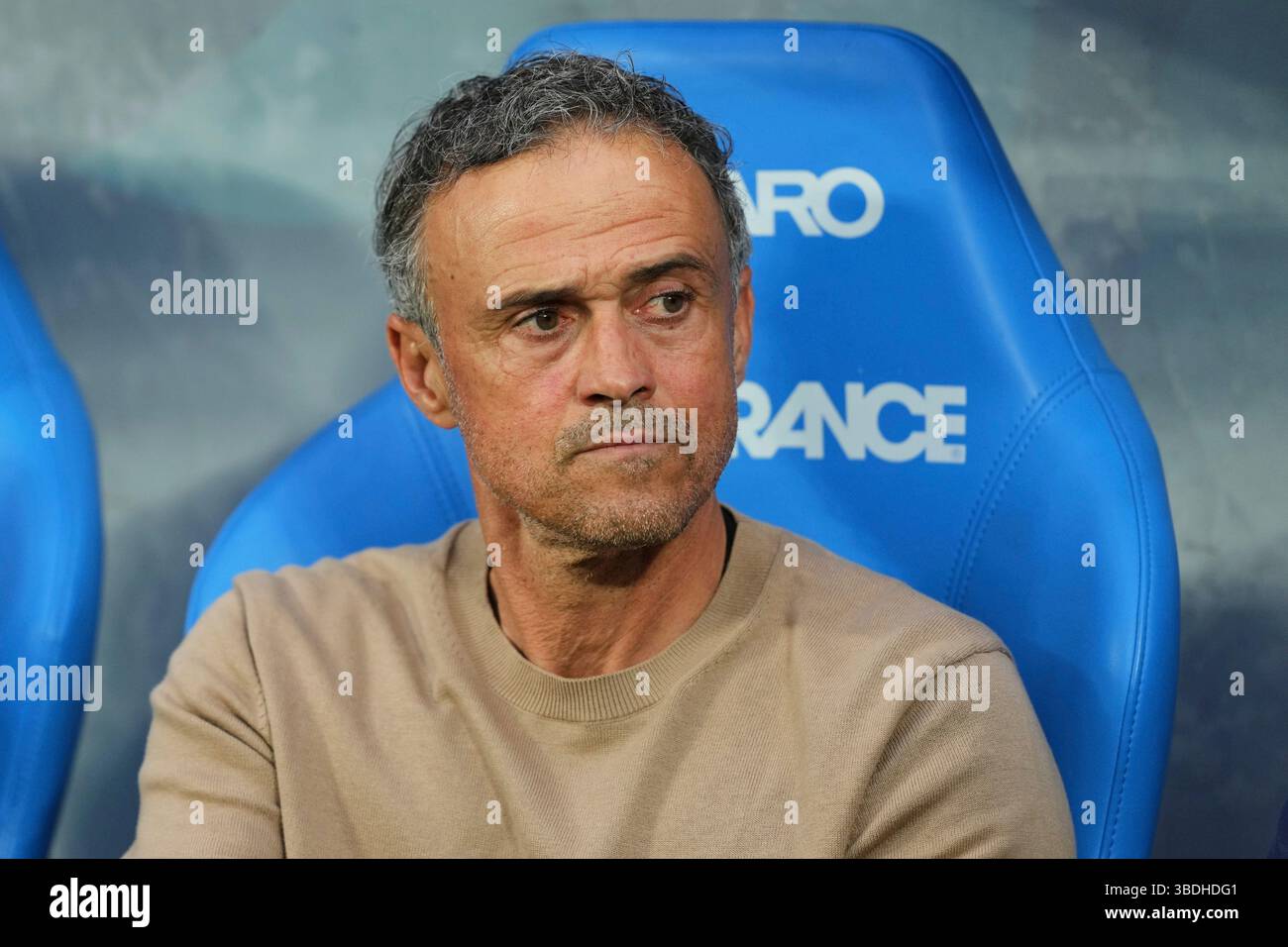 PSG's head coach Luis Enrique sits on the bench prior to the French Cup ...