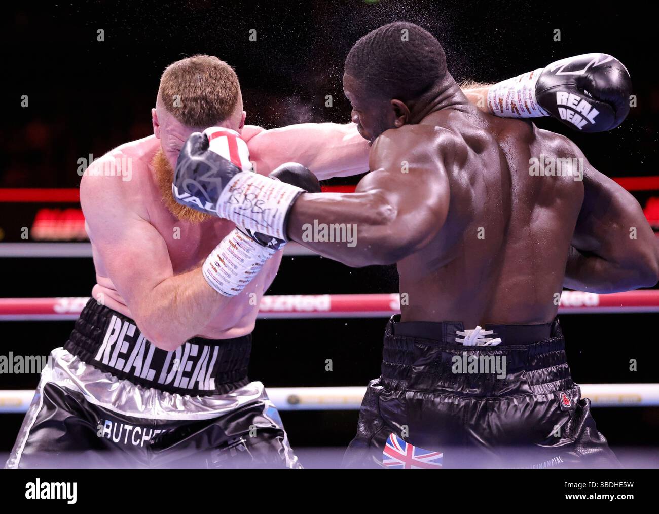 David Jamieson (left) in action against Aloys Youmbi in the vacant ...