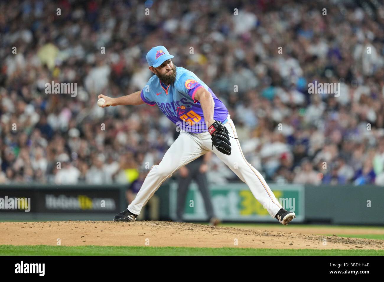 Denver CO, USA. 23rd May, 2025. Colorado pitcher Jake Bird (59) throws ...