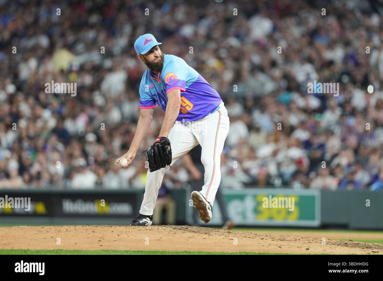 Denver CO, USA. 23rd May, 2025. Colorado pitcher Jake Bird (59) throws ...