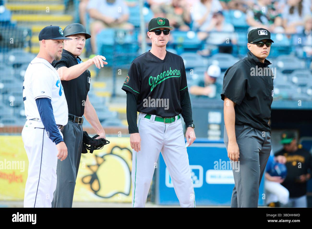 Asheville Tourists manager Nate Shaver (25), home plate umpire Gustavo ...