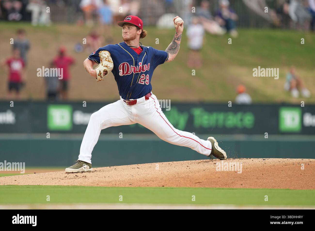 Starting pitcher Noah Dean (29) of the Greenville Drive delivers a ...
