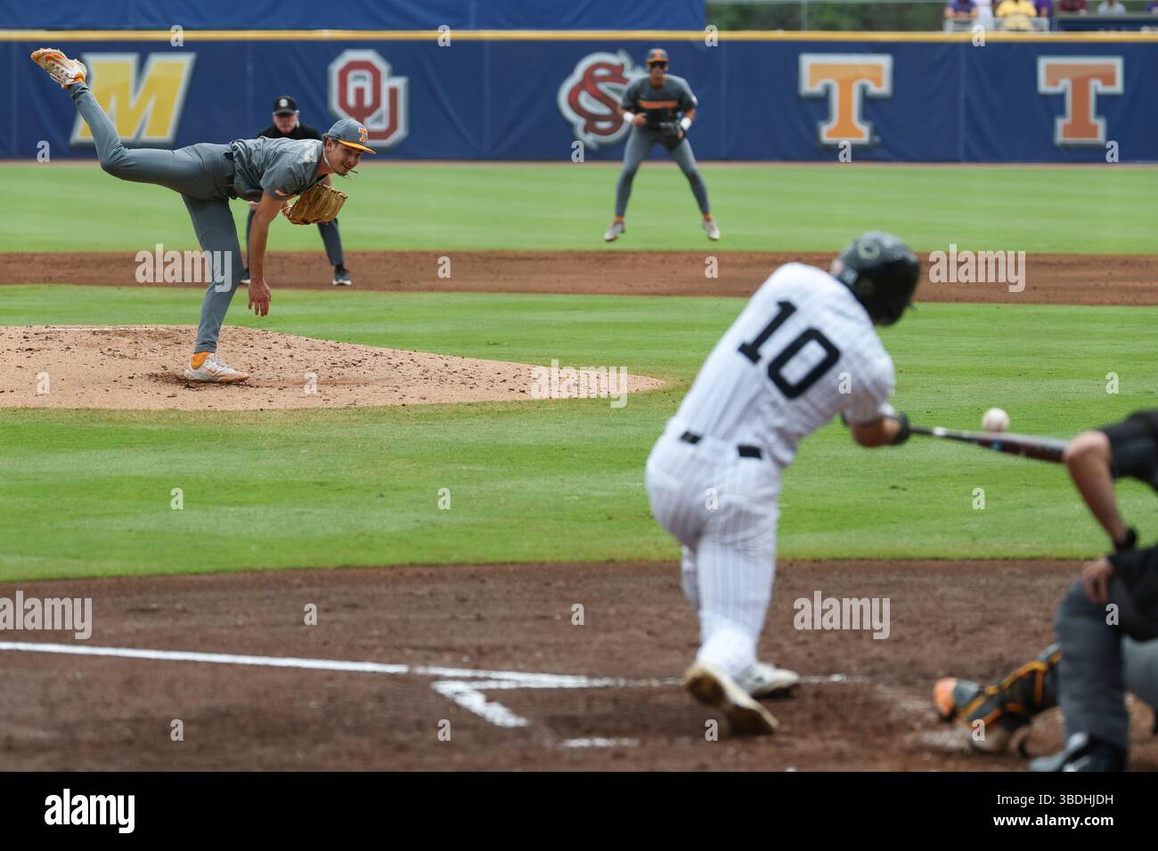 HOOVER, AL - MAY 24: Tennessee infielder Chris Newstrom (10) gets a hit ...