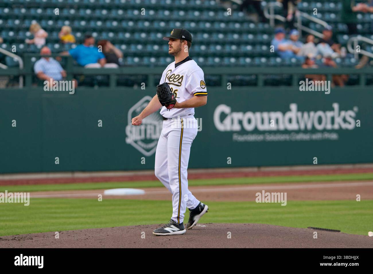 Salt Lake Bees starting pitcher Dakota Hudson (26) delivers a pitch to ...