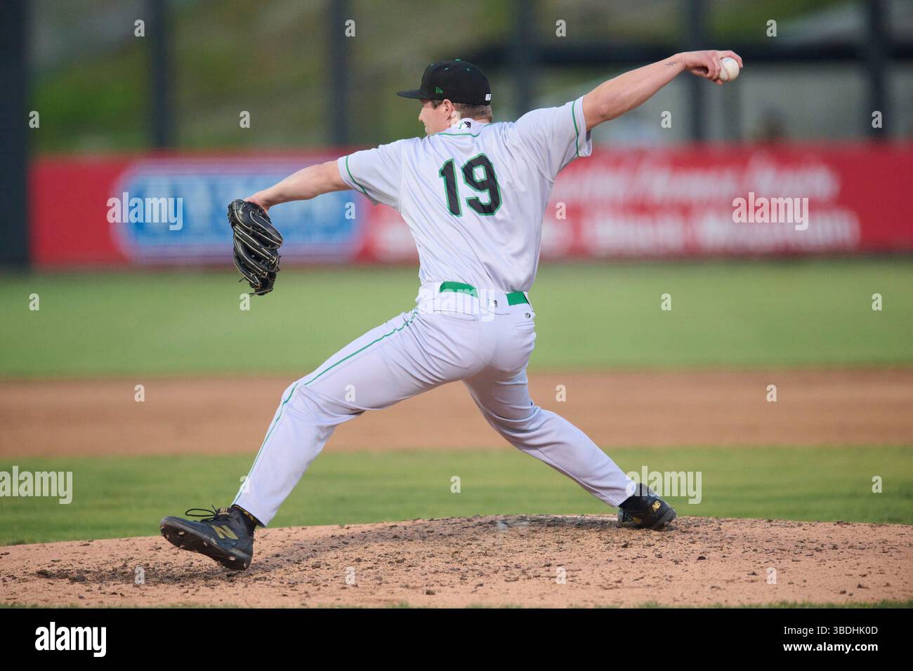 Greensboro Grasshoppers pitcher Landon Tomkins (19) delivers a pitch ...