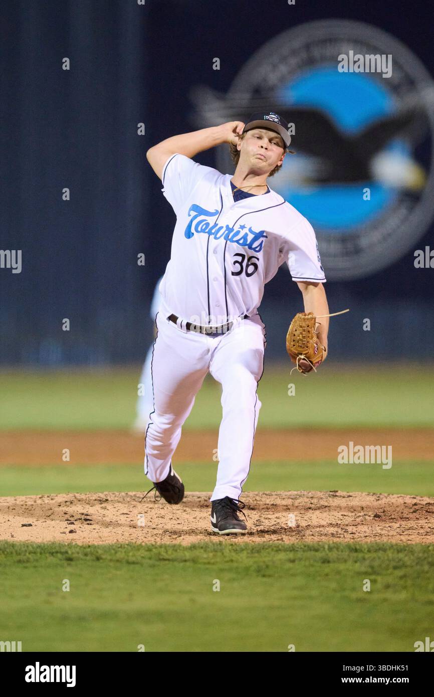 Asheville Tourists pitcher Cody Tucker (36) delivers a pitcher during a ...