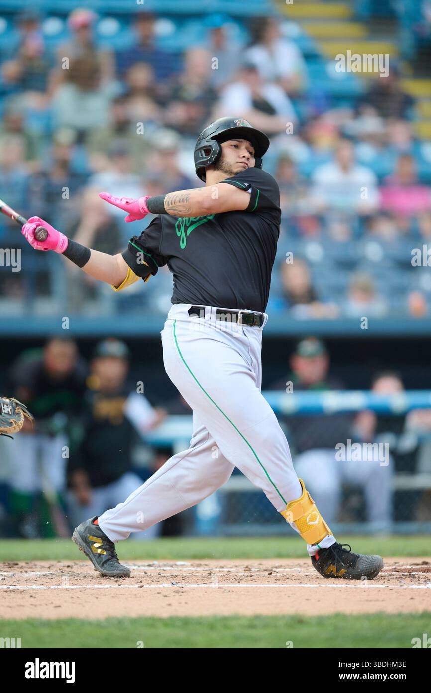 Greensboro Grasshoppers Omar Alfonzo (50) swings at a pitch during a ...