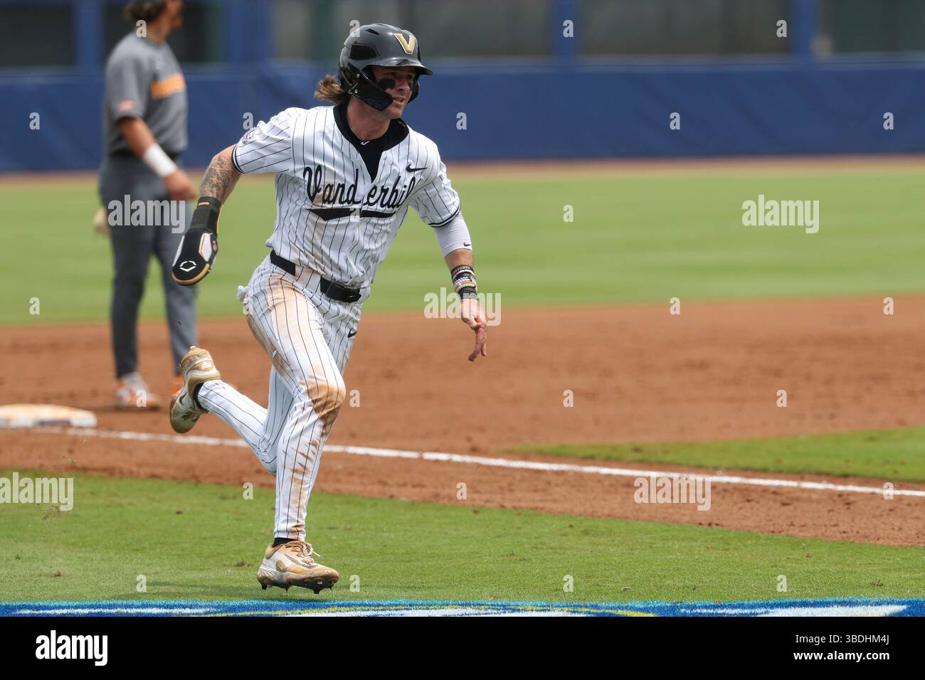 HOOVER, AL - MAY 24: Vanderbilt infielder Jonathan Vastine (13) rounds ...