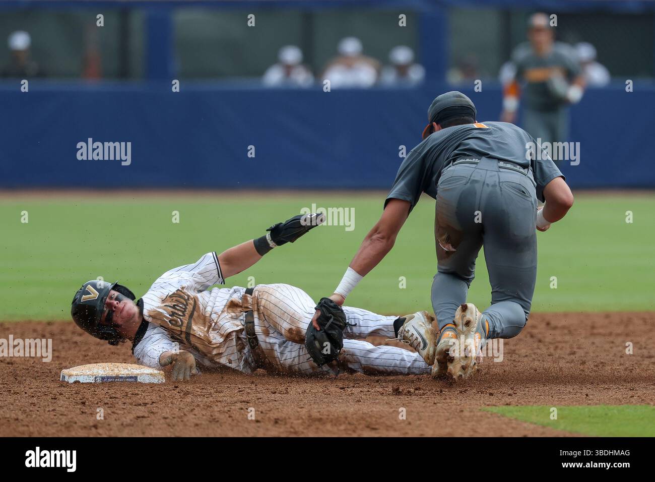 HOOVER, AL - MAY 24: Tennessee infielder Dean Curley (1) gets the tag ...