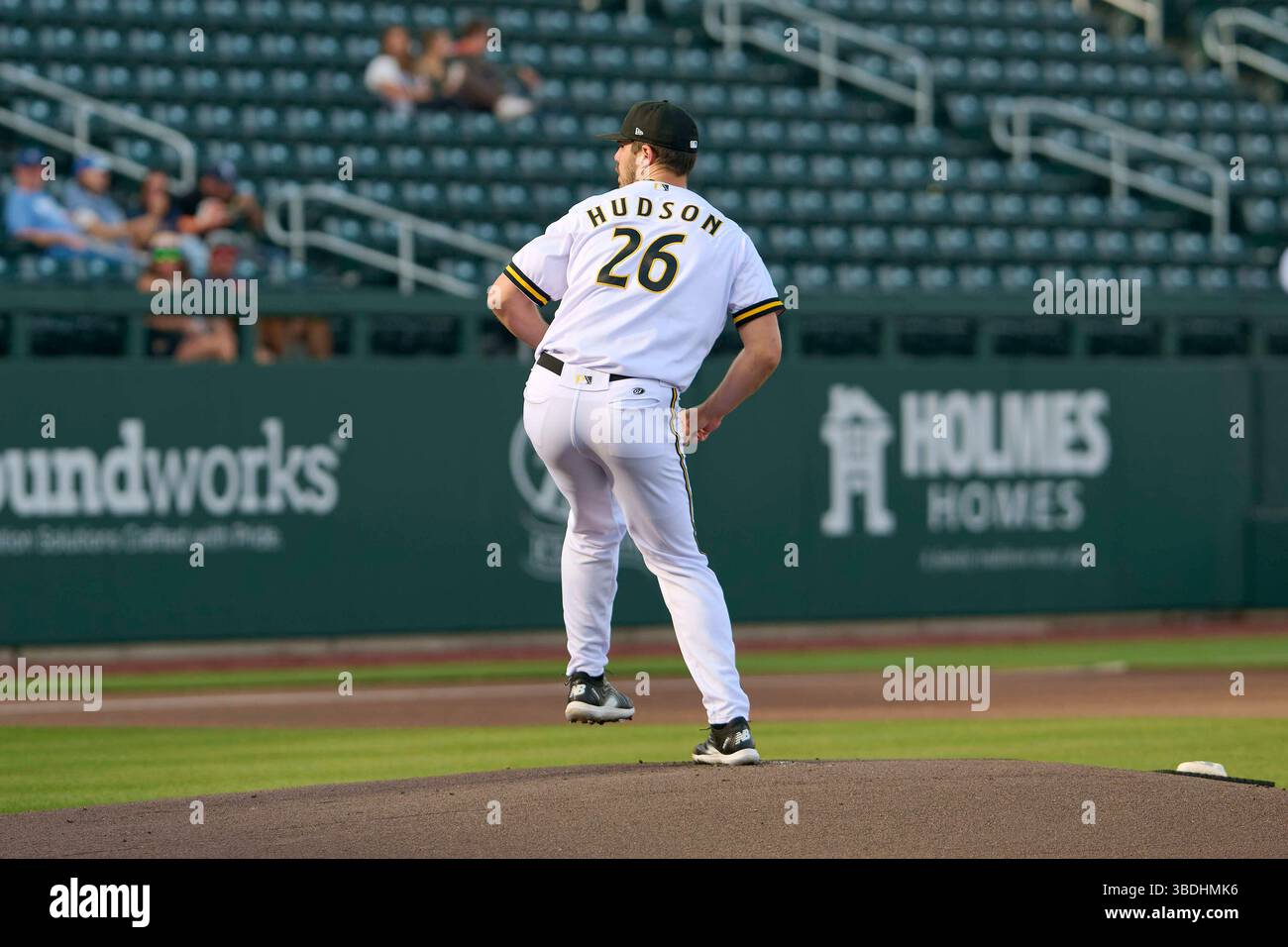 Salt Lake Bees starting pitcher Dakota Hudson (26) delivers a pitch to ...