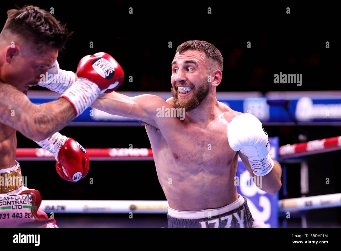 Nathaniel Collins (right) in action against Lee McGregor in the WBC ...